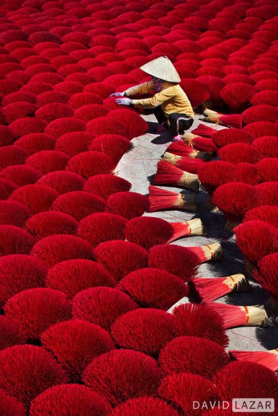 Arranging Red Incense Sticks